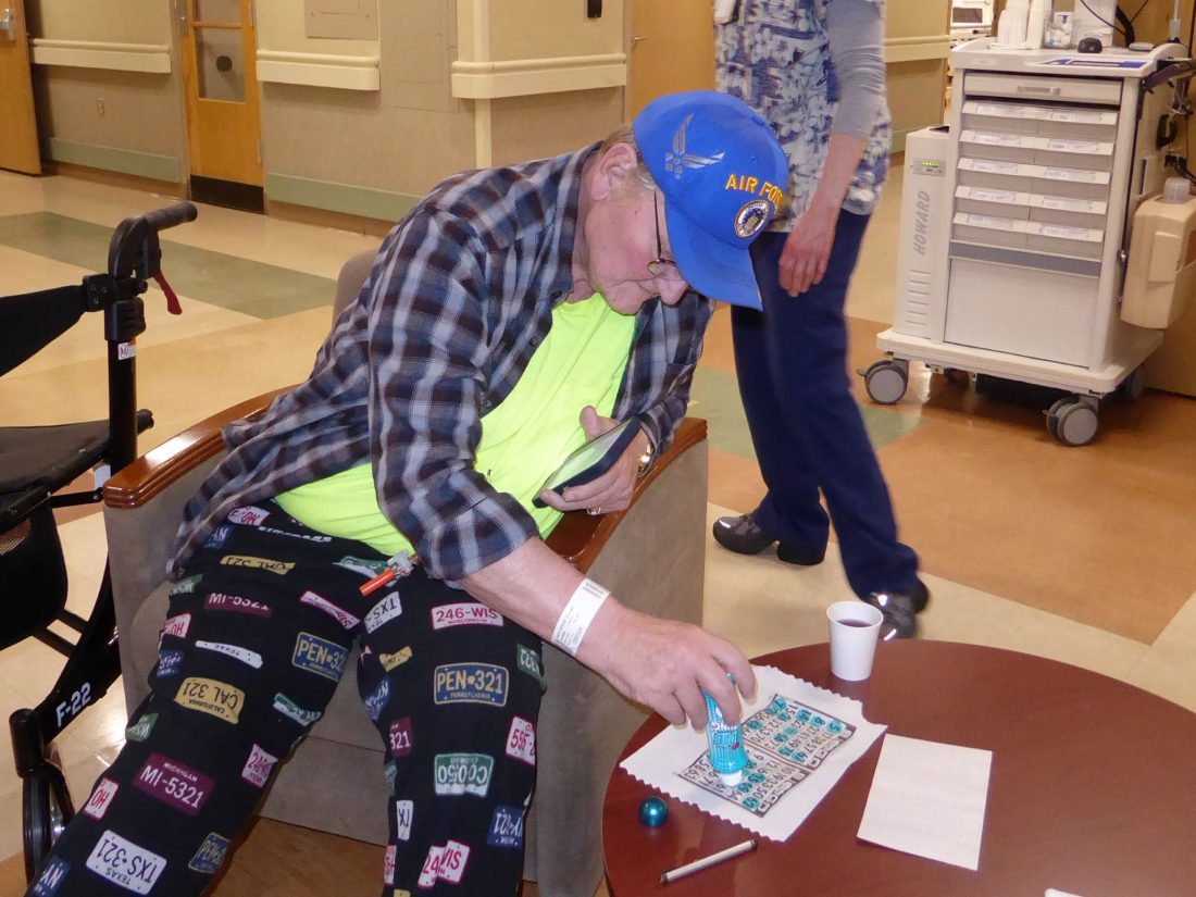 VA workers keep residents socially engaged during social distancing ...